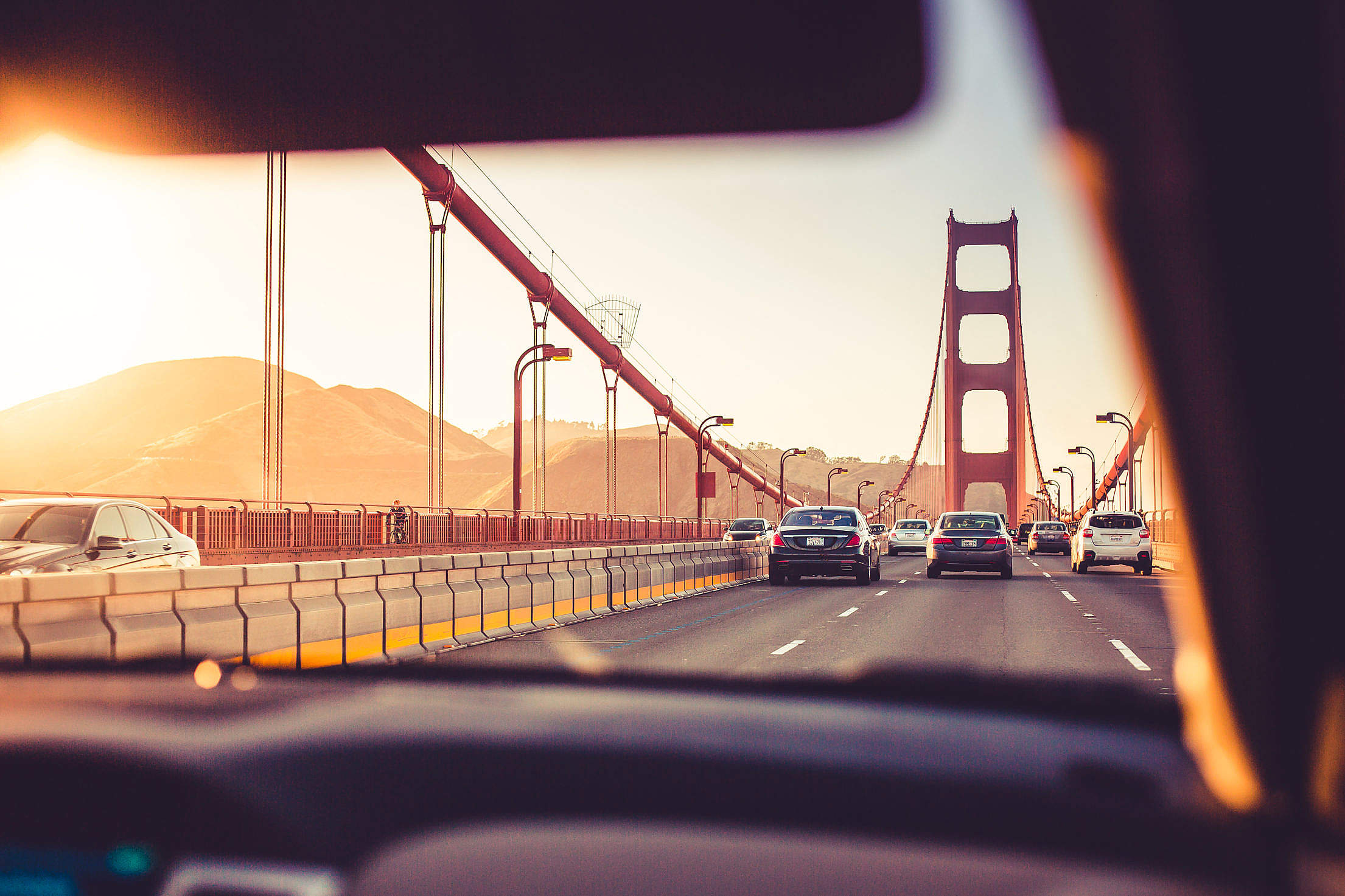 Driving Over The Golden Gate Bridge in Sunset Free Stock Photo | picjumbo