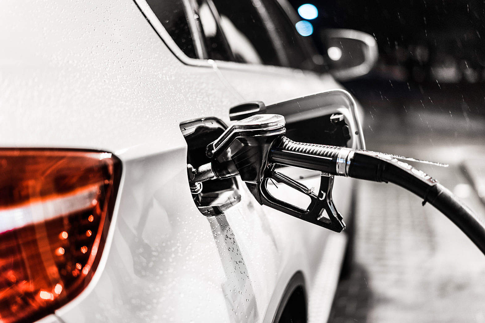 Fueling Up a Car at a Petrol Station Free Stock Photo | picjumbo