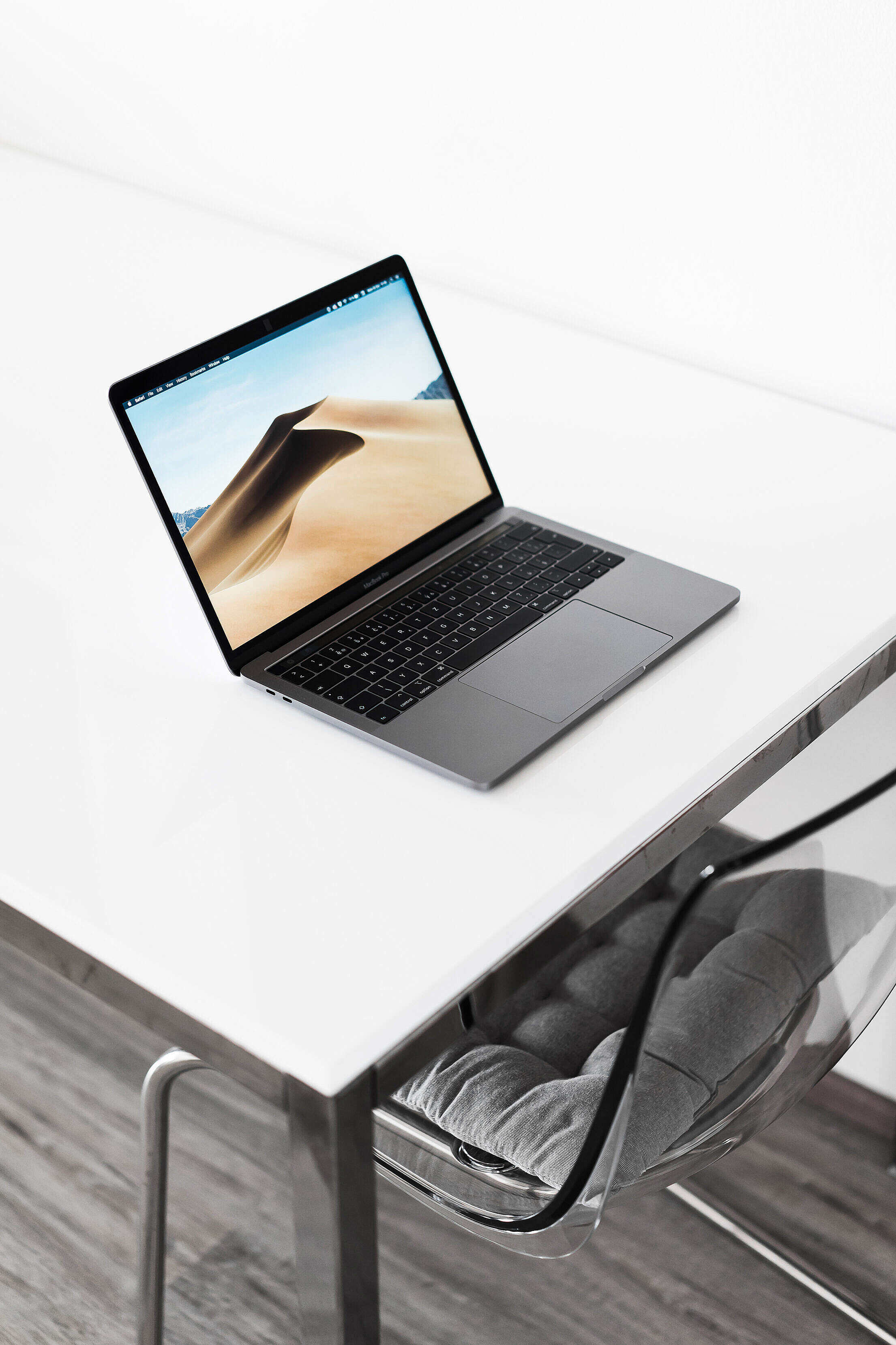 MacBook Pro on White Table at Home Free Stock Photo | picjumbo