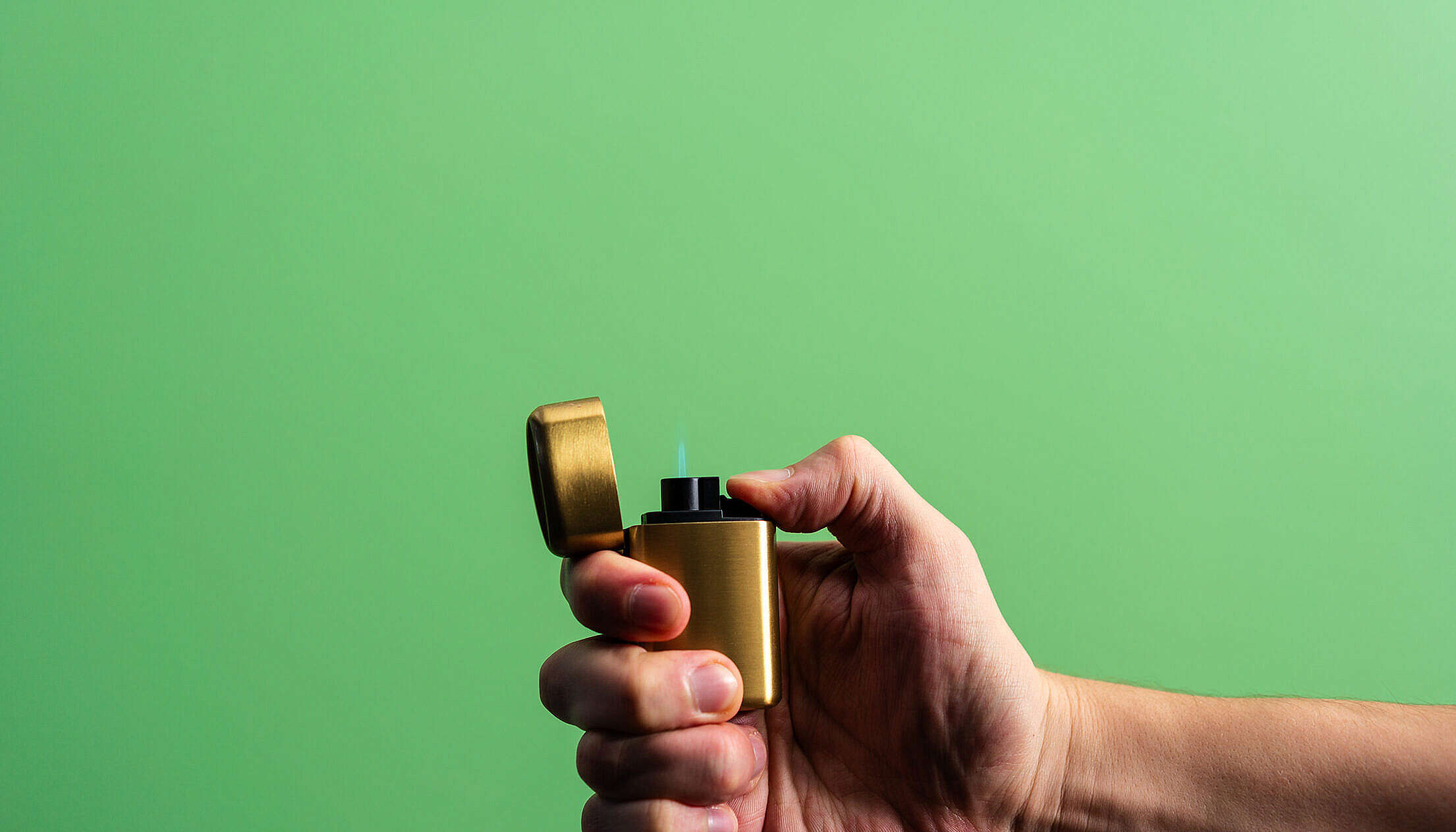Man Using a Jet Flame Lighter Free Stock Photo | picjumbo