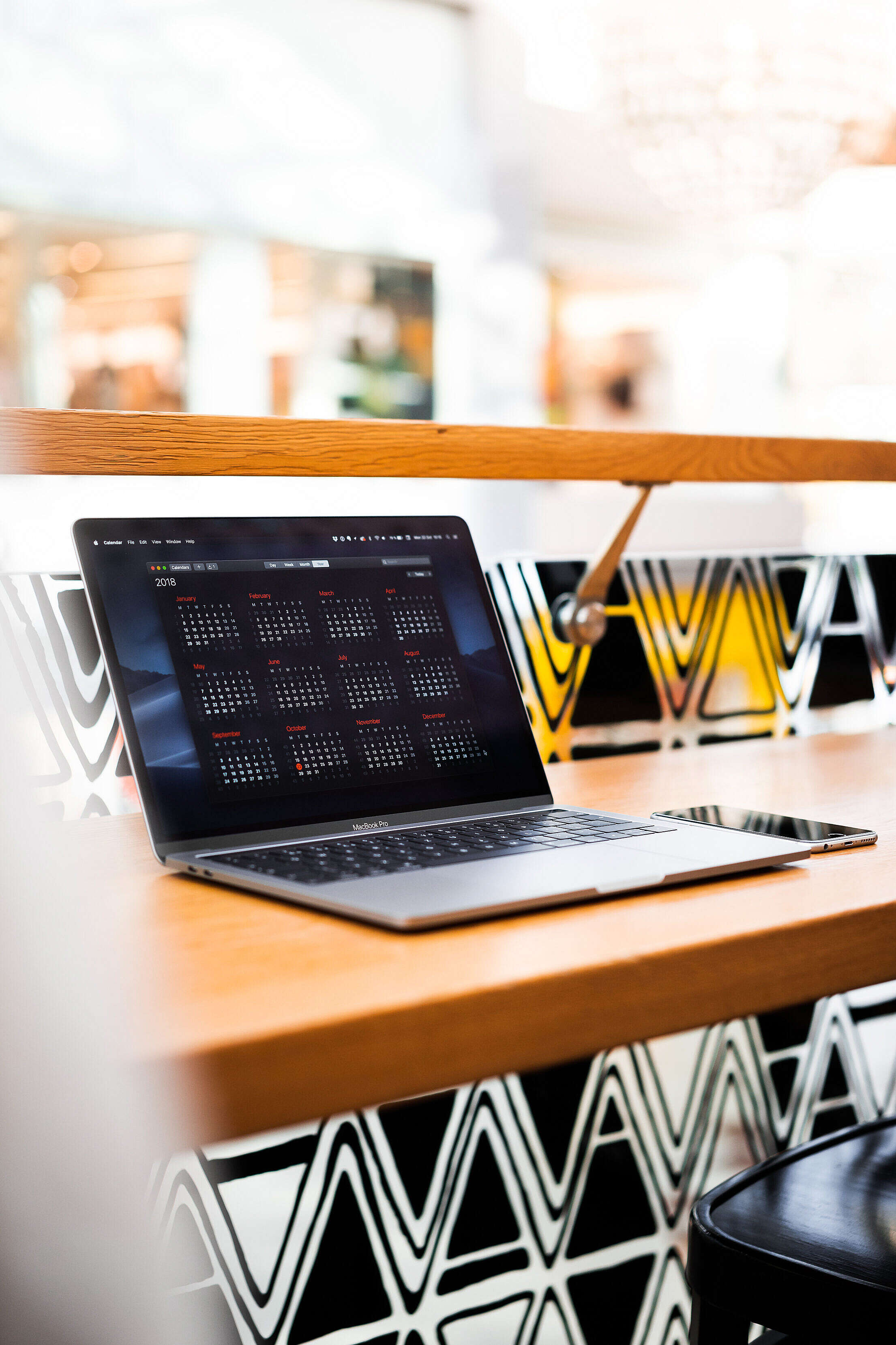 Modern Laptop in Café Vertical Free Stock Photo | picjumbo