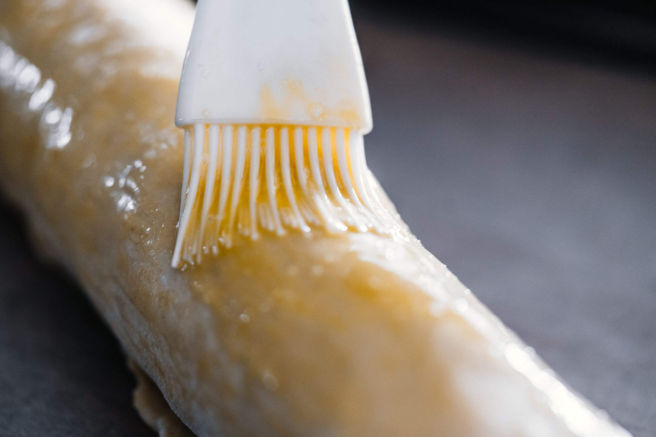 Smearing Raw Apple Strudel with Brush in Yolk Free Stock Photo | picjumbo