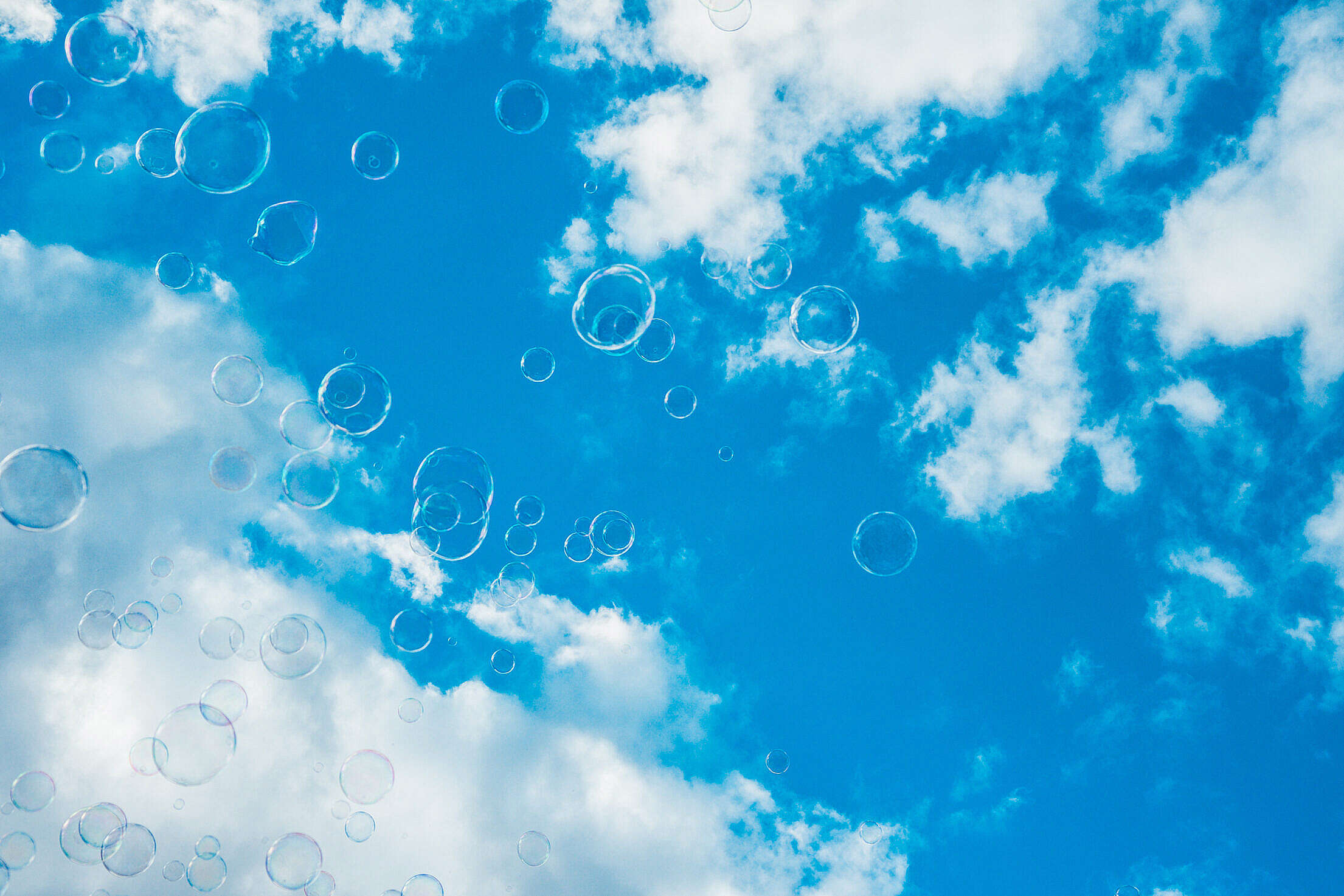 Thousands of Bubbles Against Bright Blue Sky Free Stock Photo | picjumbo