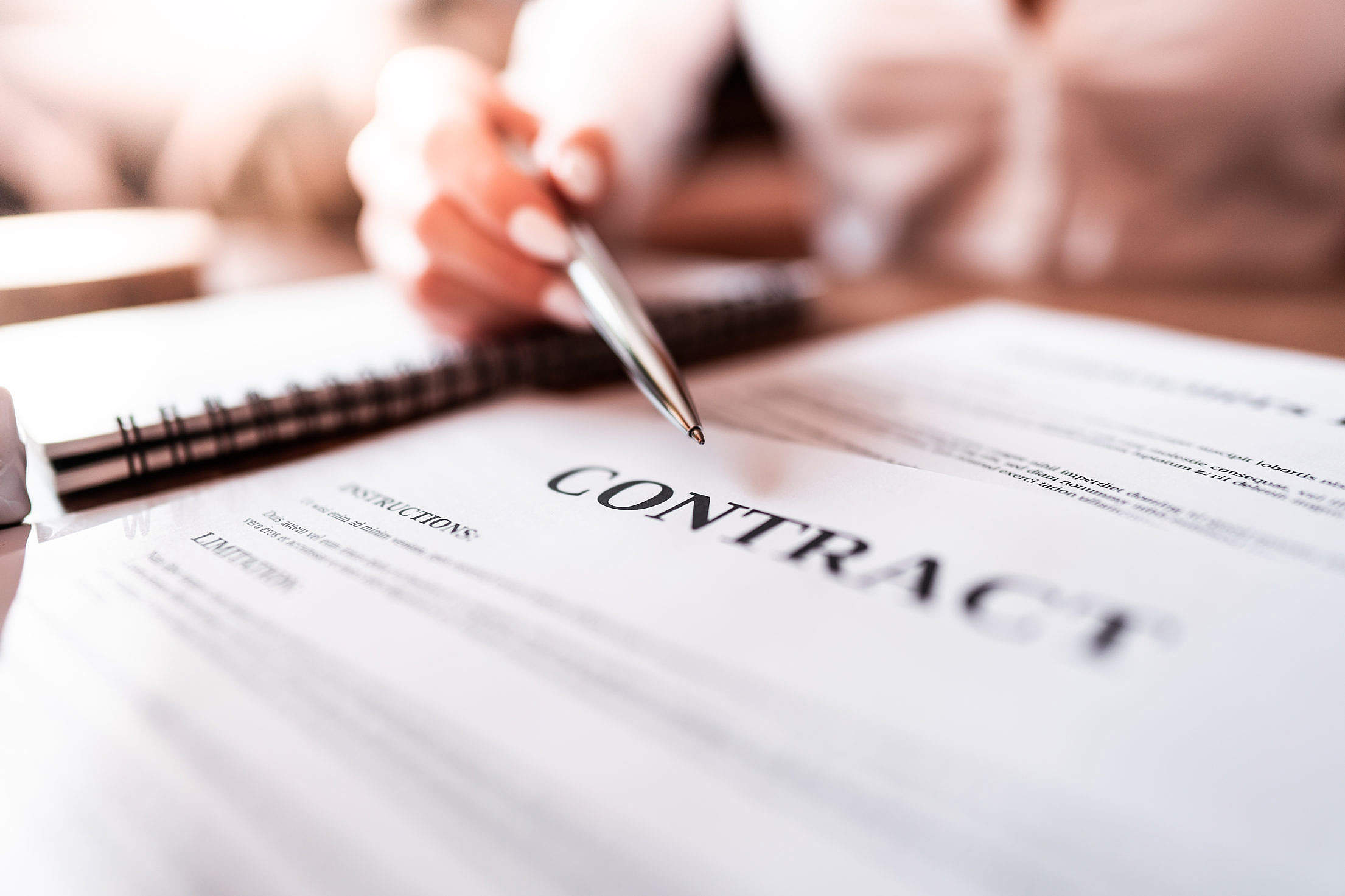 Woman Pointing at Business Contract with Silver Pen Free Stock Photo ...